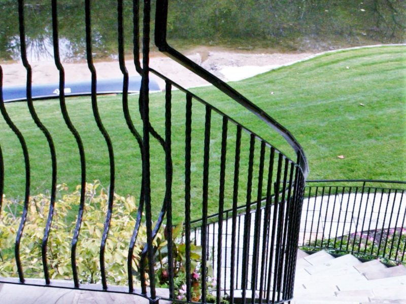 Curved Staircase, Wrought Iron Belly Rail - Great Lakes Metal Fabrication