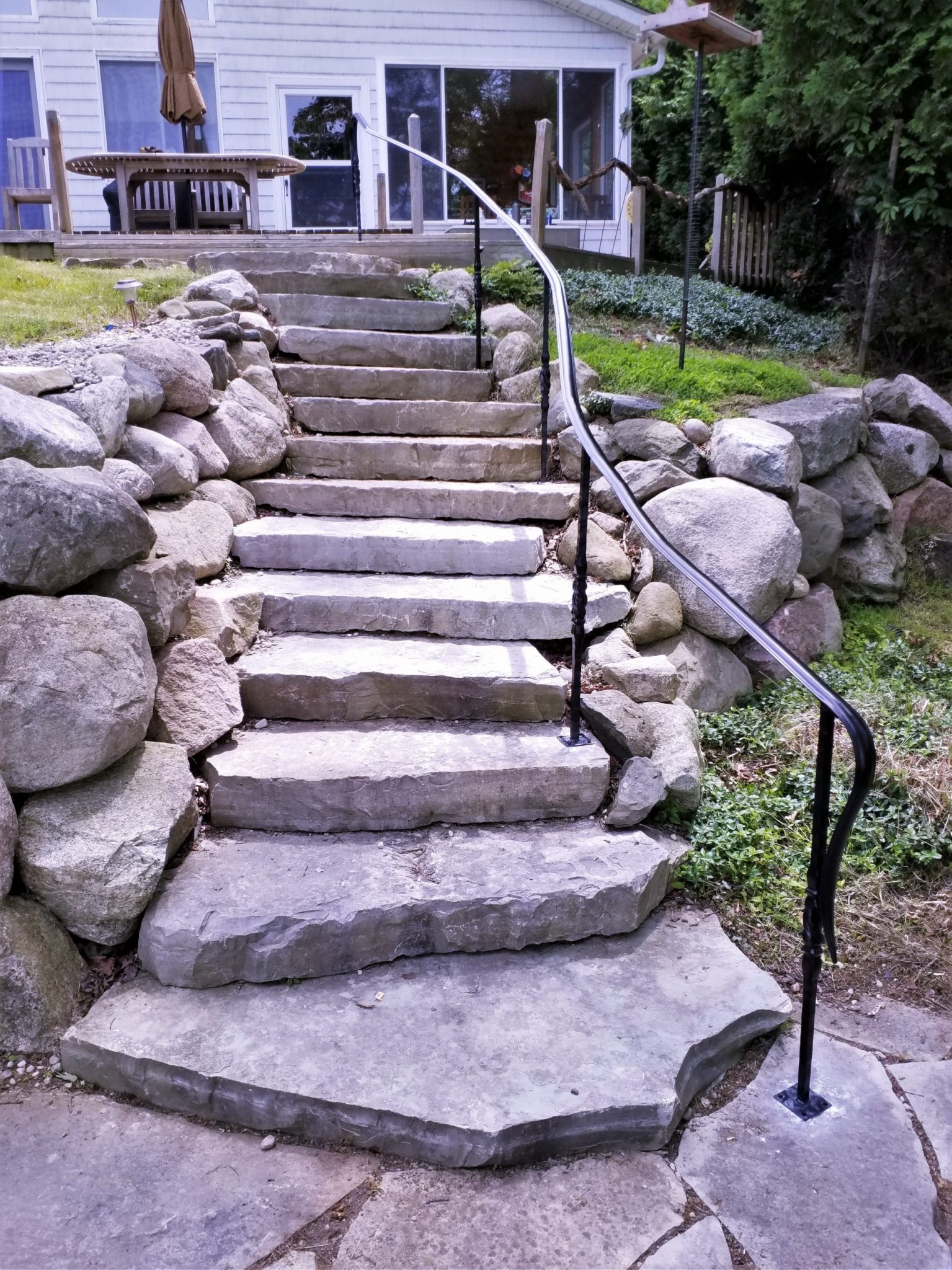 Decorative Wrought Iron Rail on Stone Steps - Great Lakes Metal Fabrication