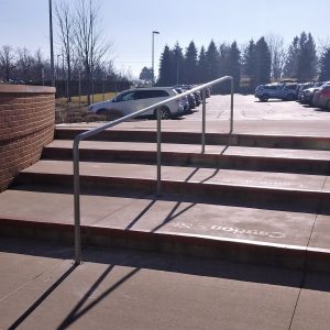 Stainless Steel Pipe Rail at Concrete Steps - Great Lakes Metal Fabrication