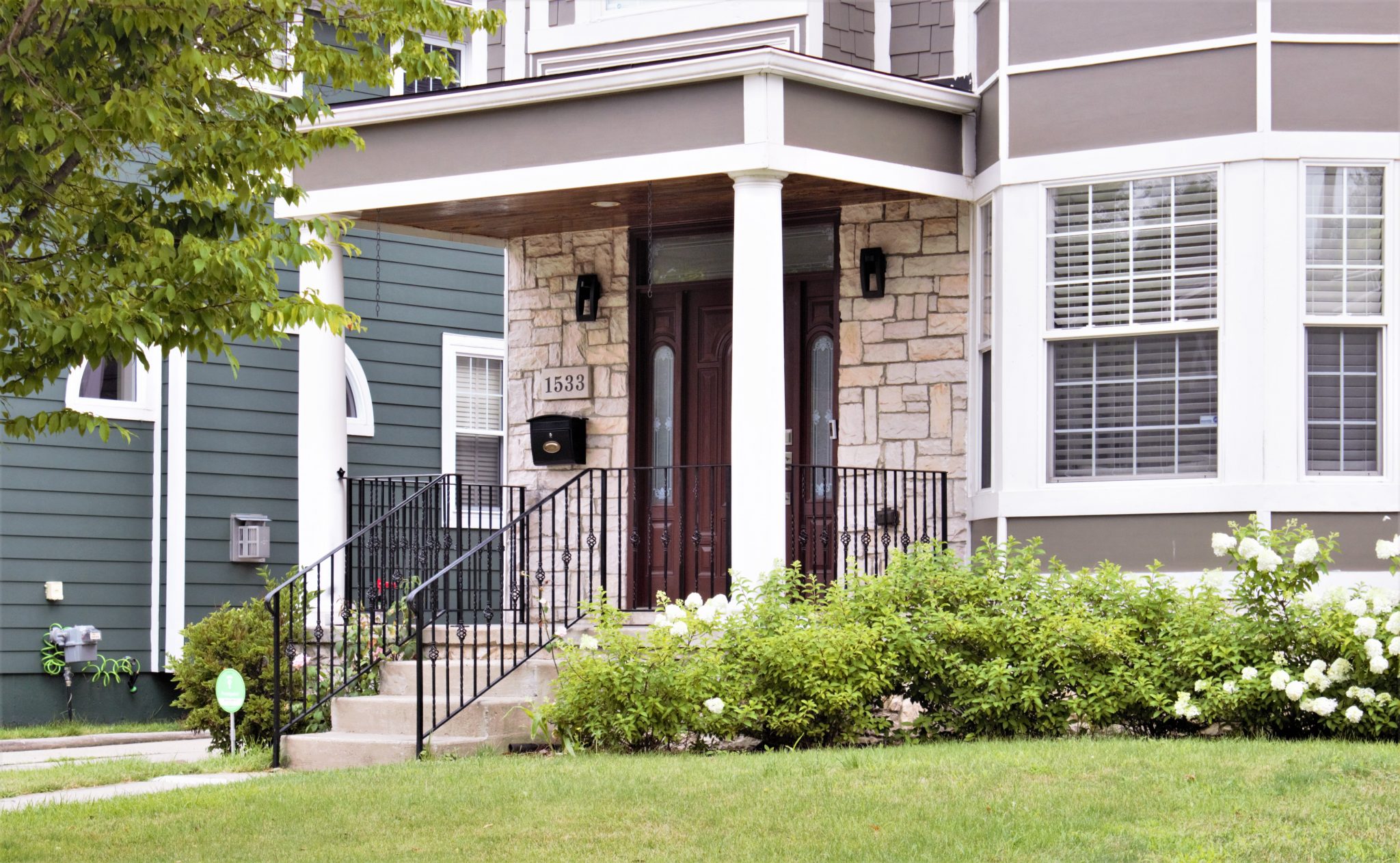 Metal Porch Rail with Baskets and Collars - Great Lakes Metal Fabrication