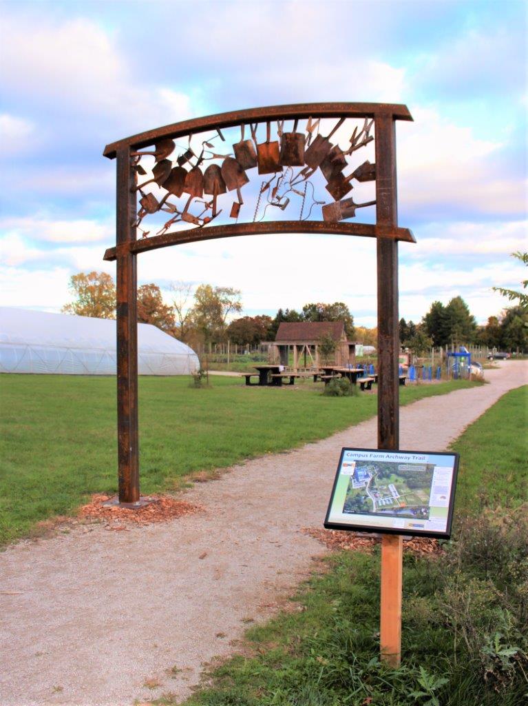 Rustic Metal Archways with Corten Steel & Vintage Tools